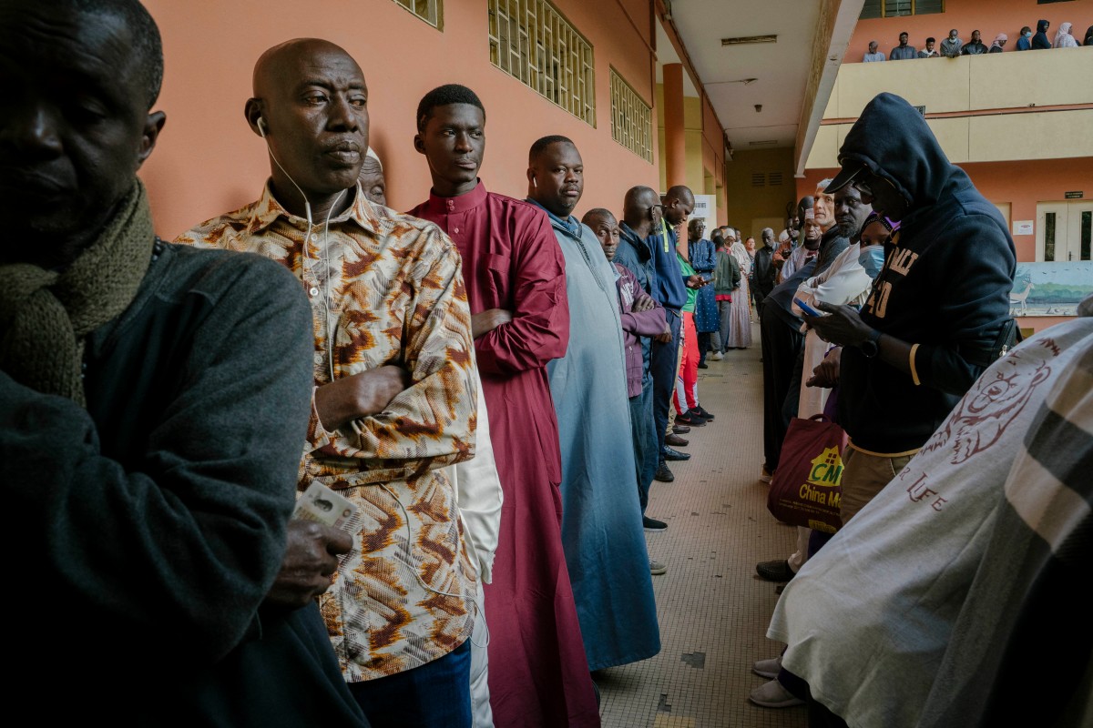 Senegal votes for new president after years of crisis - The Telegraph ...